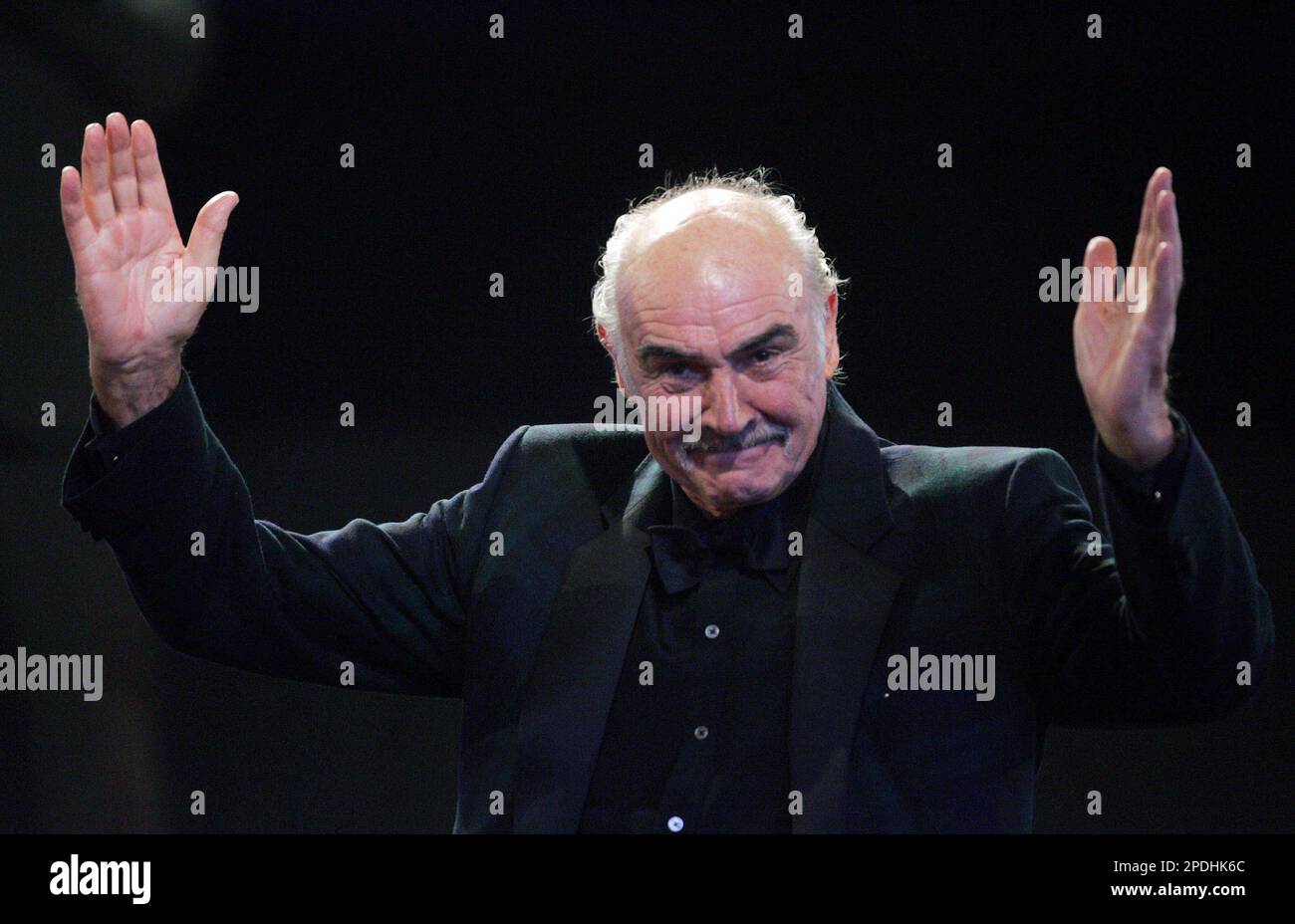 British actor Sir Sean Connery shows hands up at the European Film ...