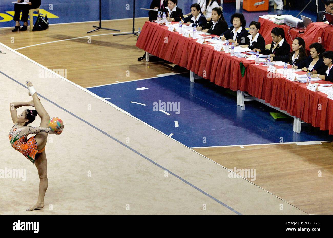 Darratun Nashihin from Maylaysia performs the ball segment in front of ...