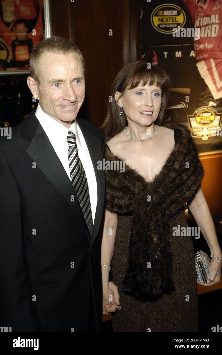 Mark Martin, left, and his wife arrive at NASCAR's NEXTEL Cup Series ...