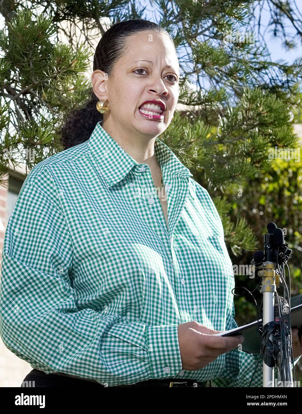 Denver attorney Leta Holden, right, speaks during a news conference she ...