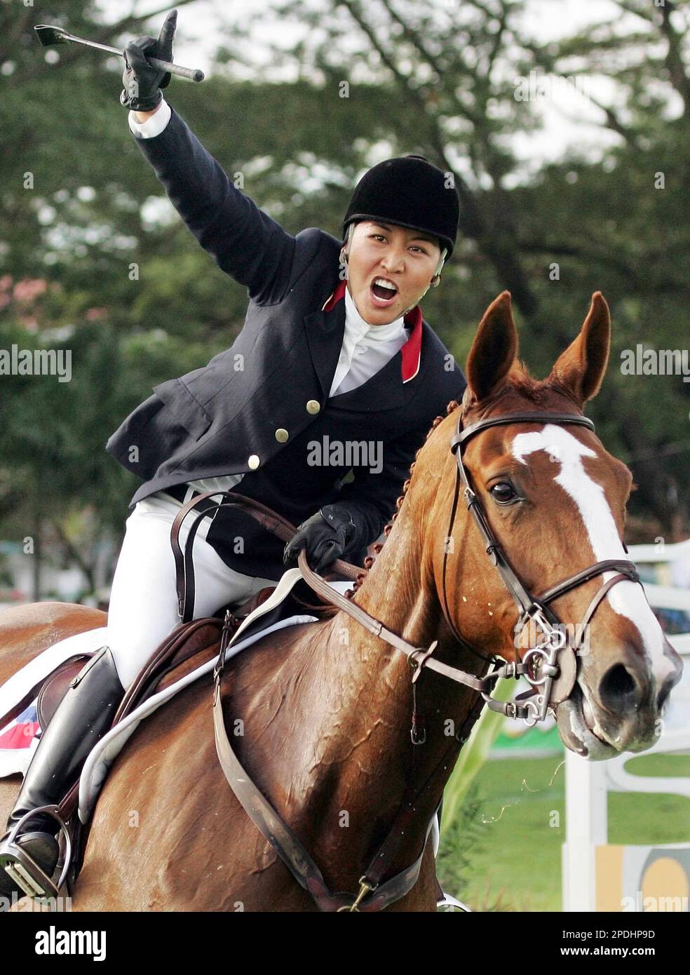 Philippines Toni Leviste flashes the no. 1 sign after finishing the ...