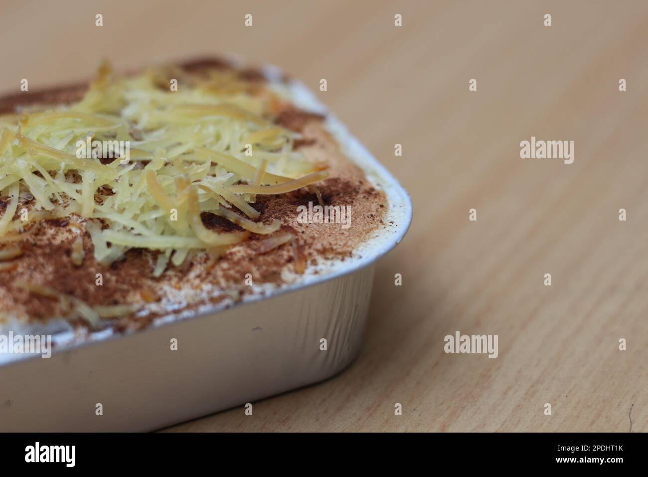 a close up of klapertart which is a typical food from Manado, Indonesia ...