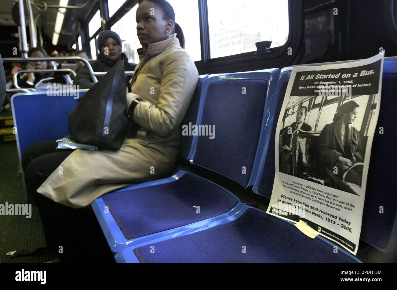 A poster entitled "It All Started On A Bus," is posted on the front ...