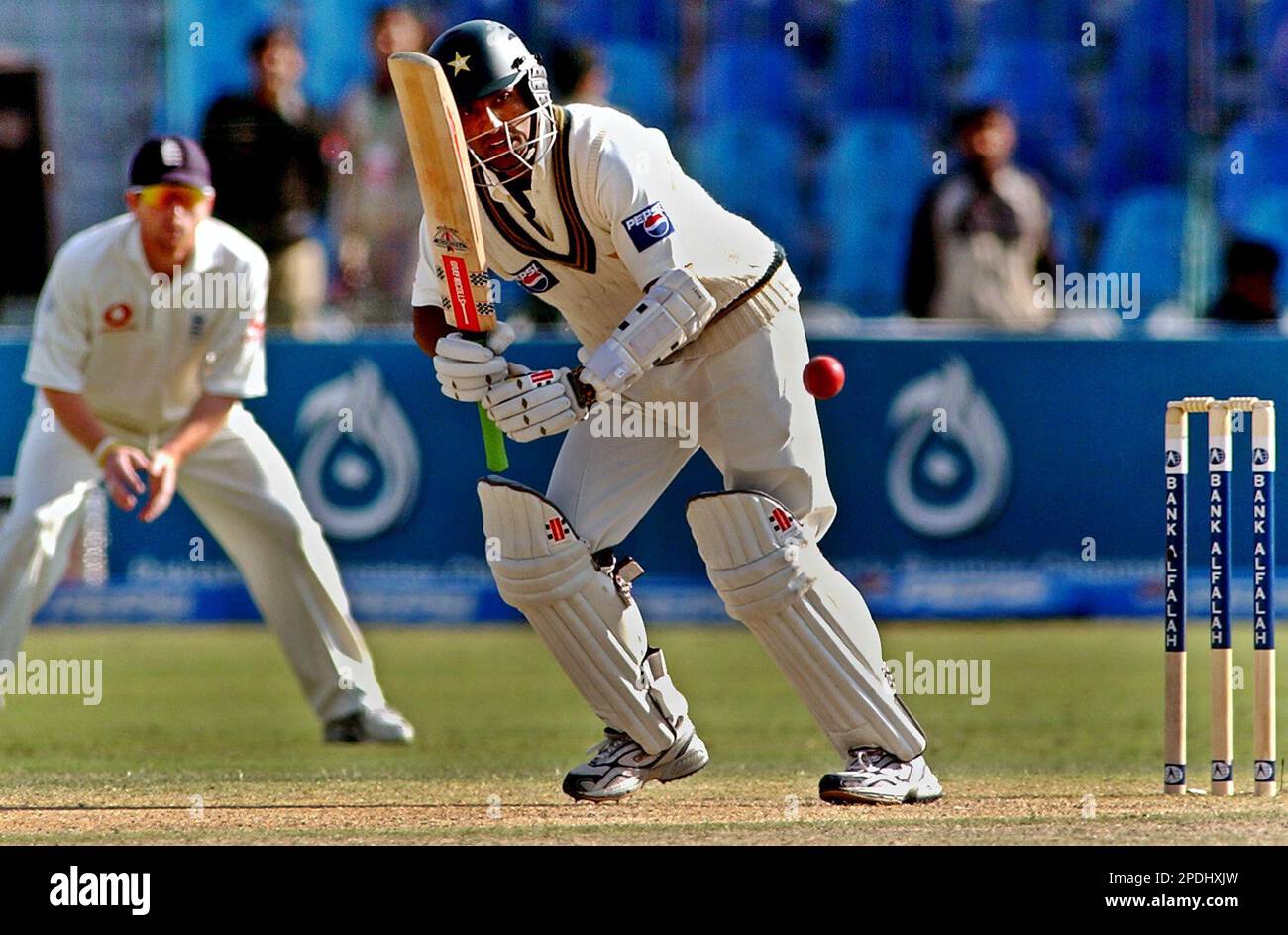 Pakistani batsman Mohammad Yousuf, right, follows the ball after play a ...