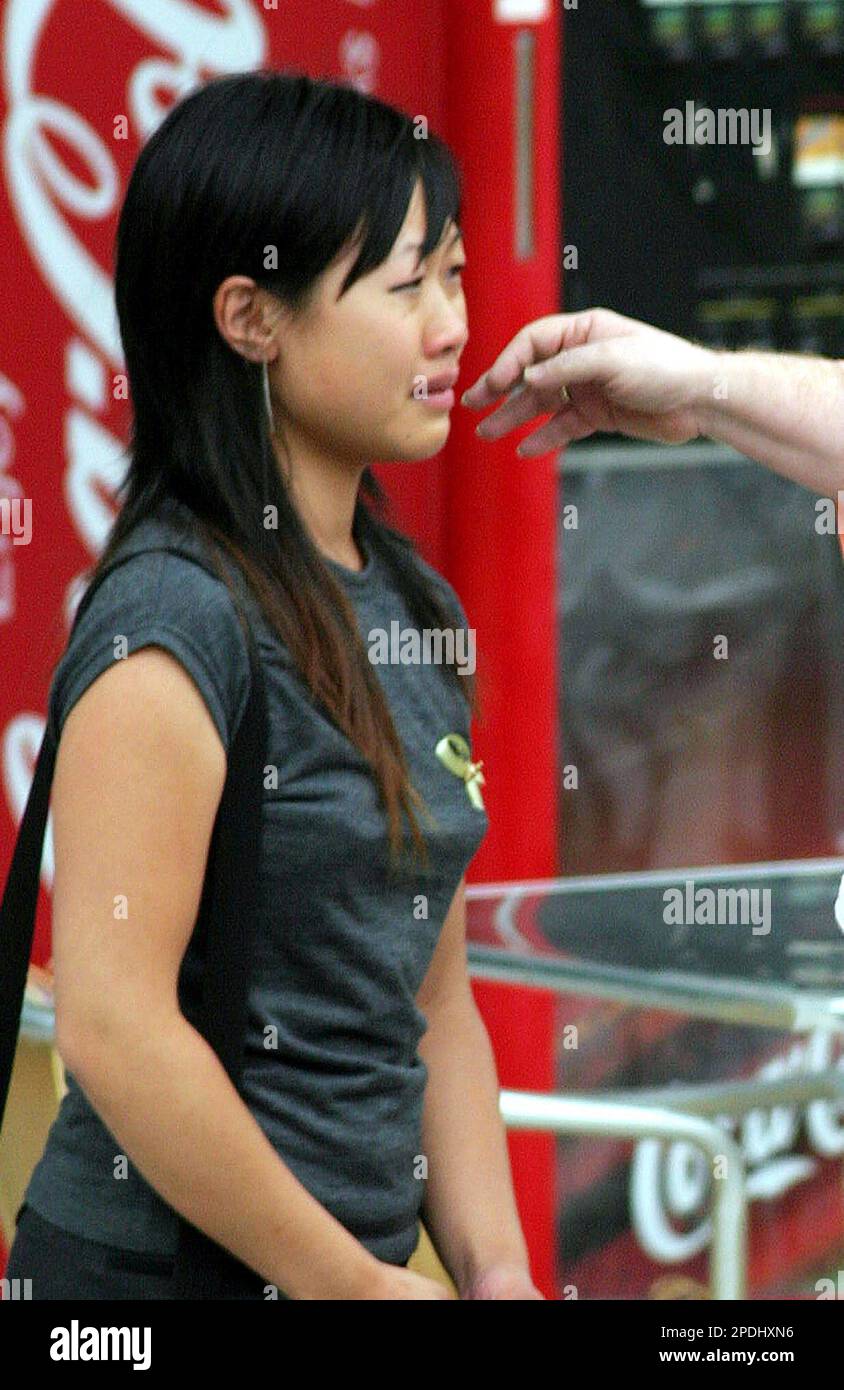 Bronwyn Lew weeps as she leaves the Singapore Changi Prison, Wednesday ...