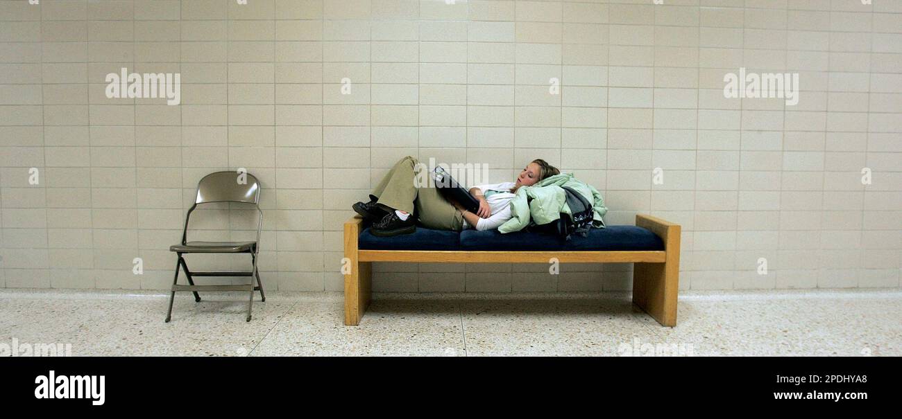 Lindsay Huntsman tries to get some shut eye between classes Tuesday ...