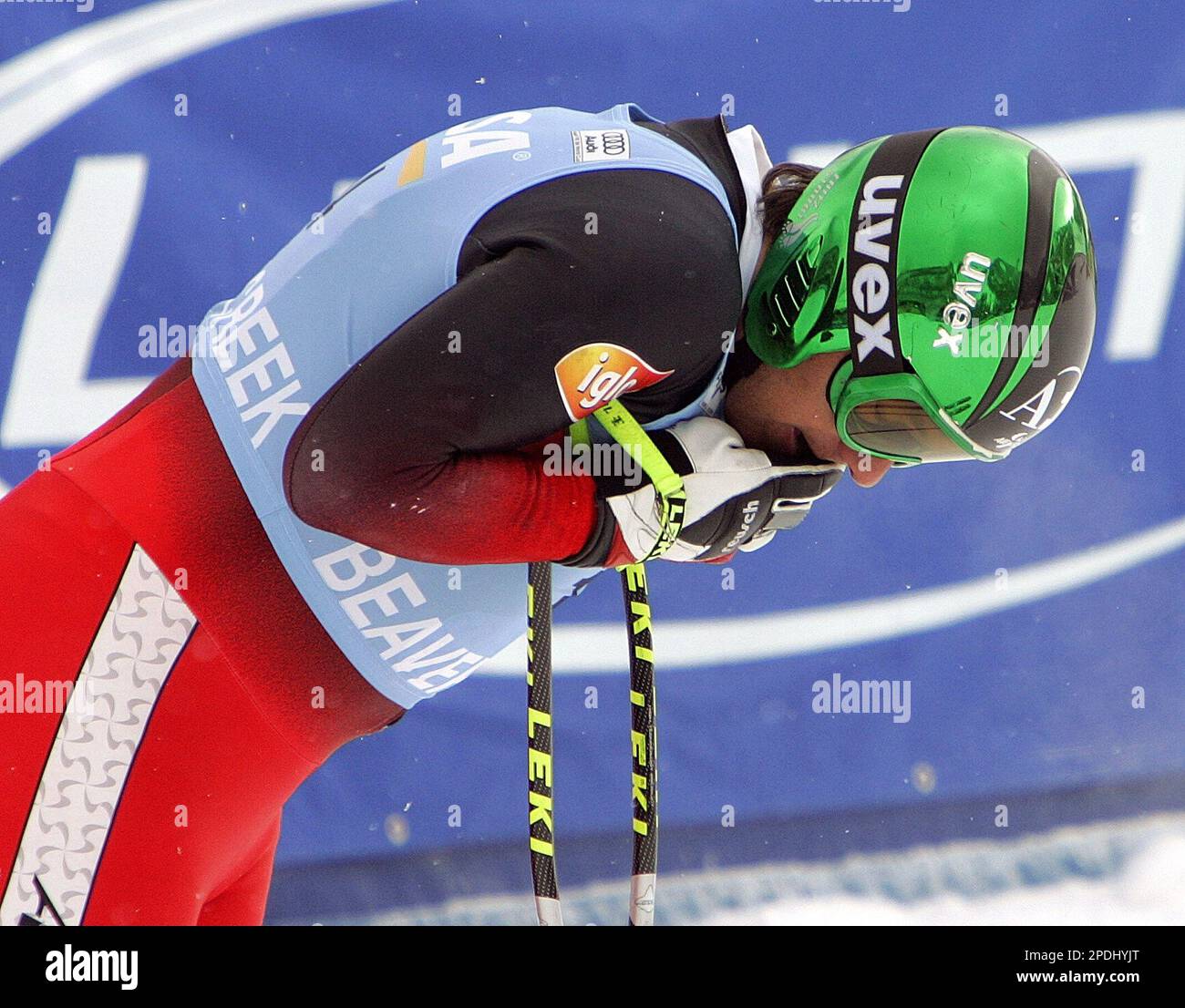 Austrian ski racer Fritz Strobl rethinks his run after finishing with ...