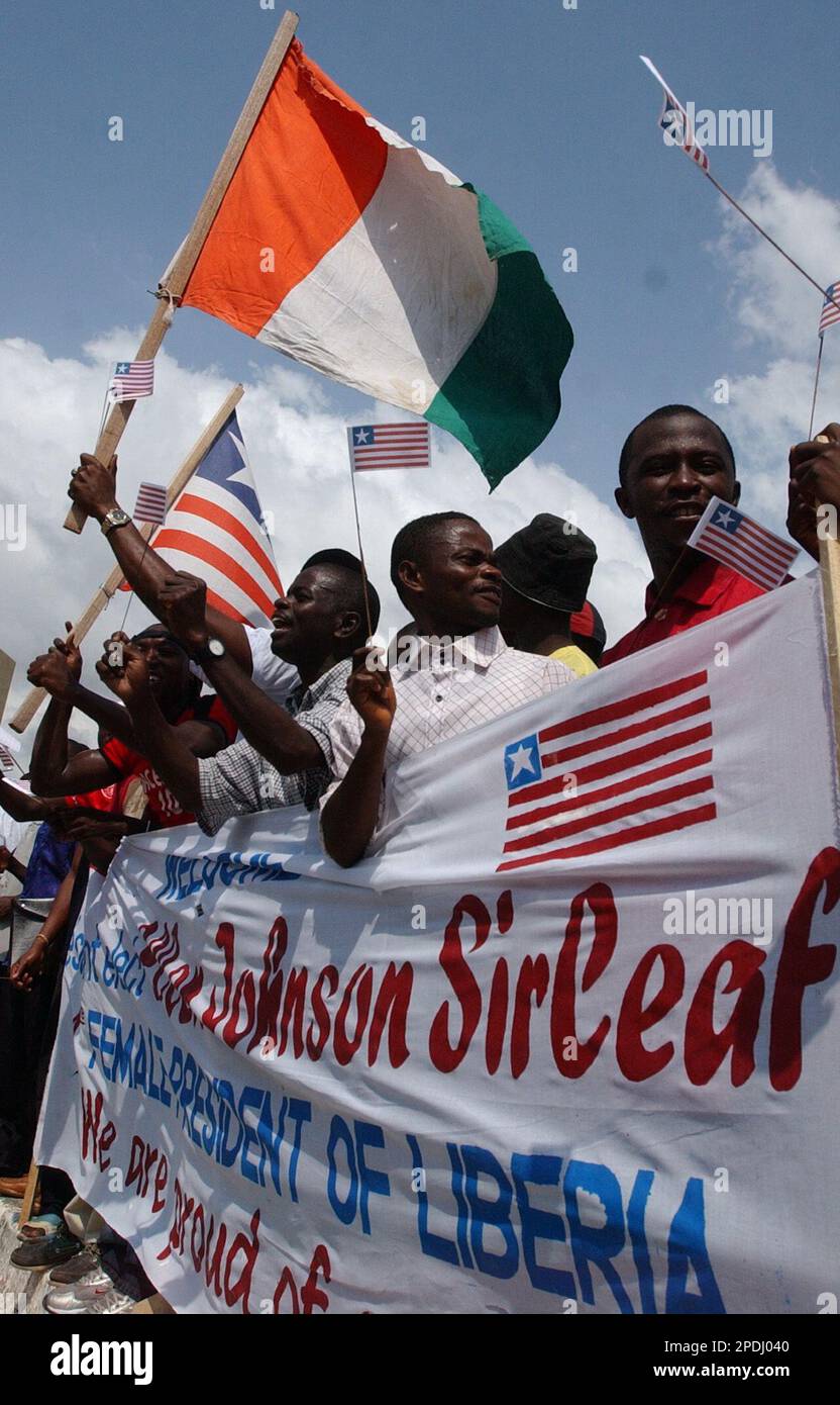 People celebrate as Liberia's President-elect Ellen Johnson-Sirleaf ...