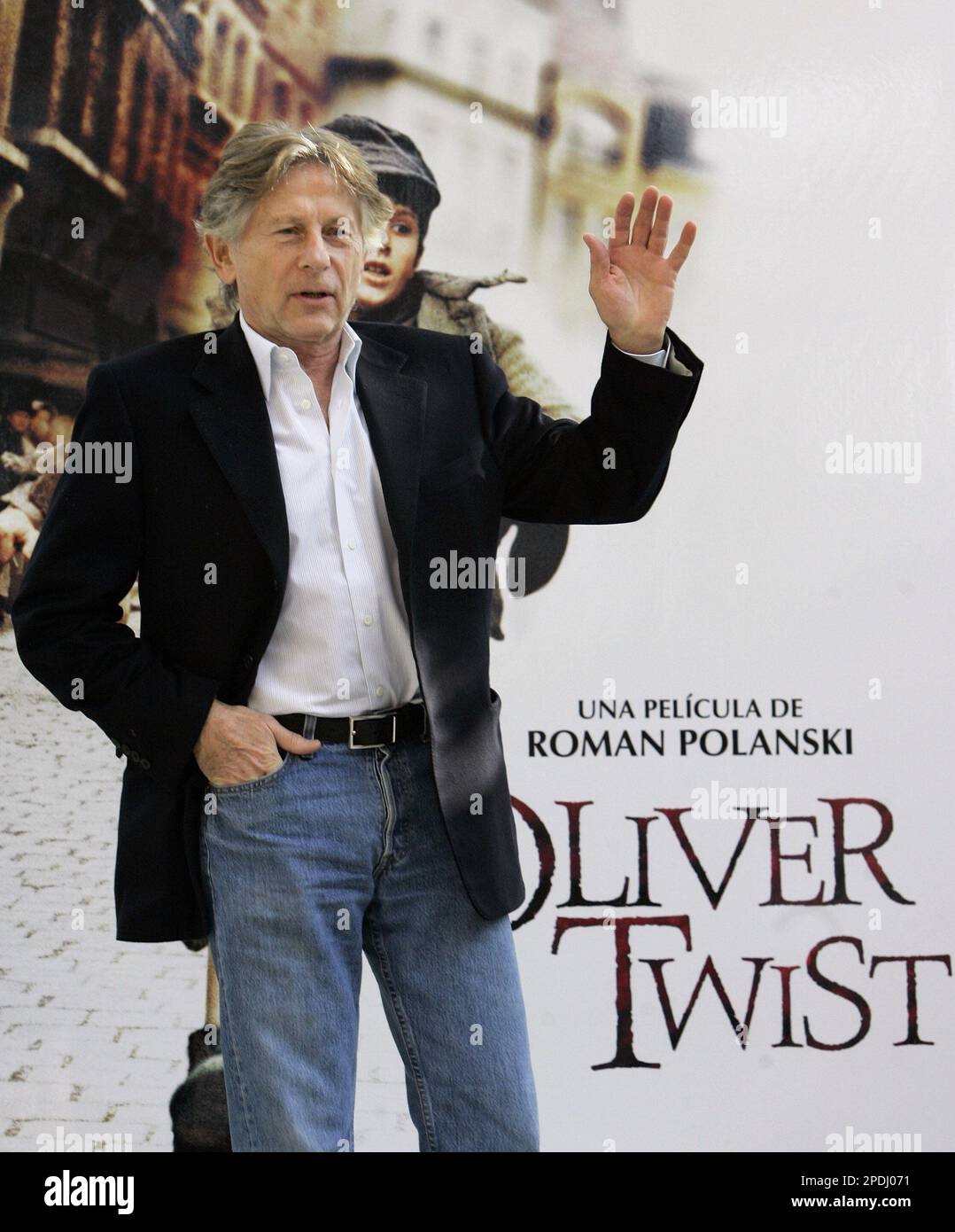 Polish film director Roman Polanski waves during a photocall for his ...