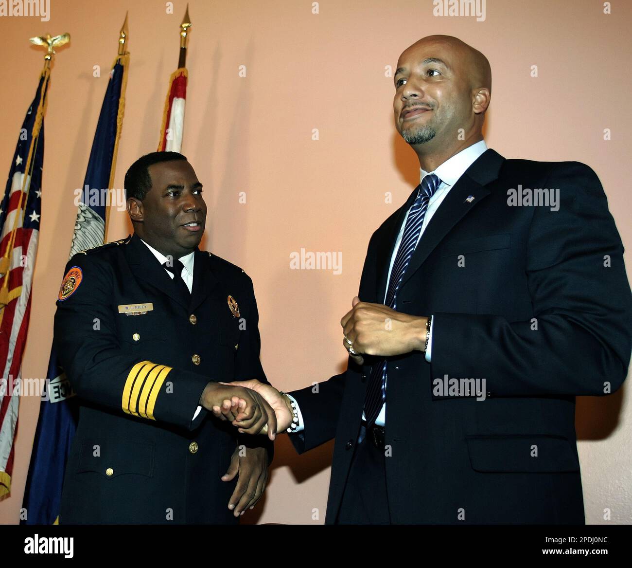 Mayor Ray Nagin, right, shakes hands with Warren J. Riley after ...