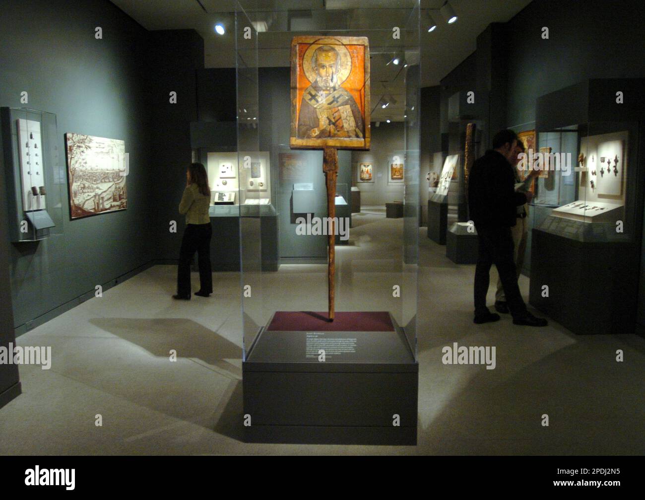 Visitors view the exhibition "Sacred Arts and City Life : The Glory of ...