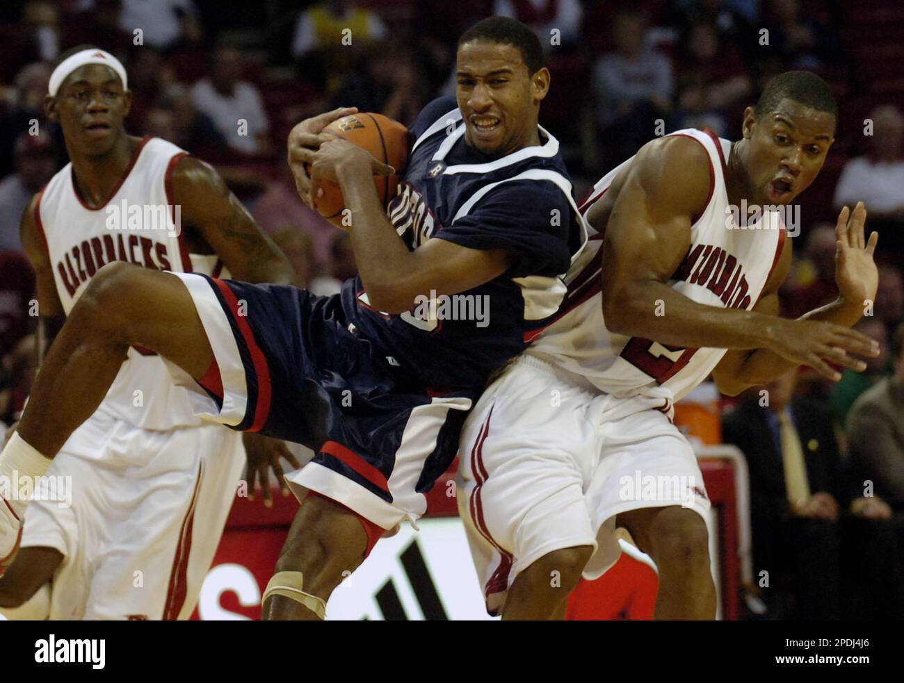 Arkansas' Jonathon Modica, right, reacts and teammate Ronnie Brewer ...