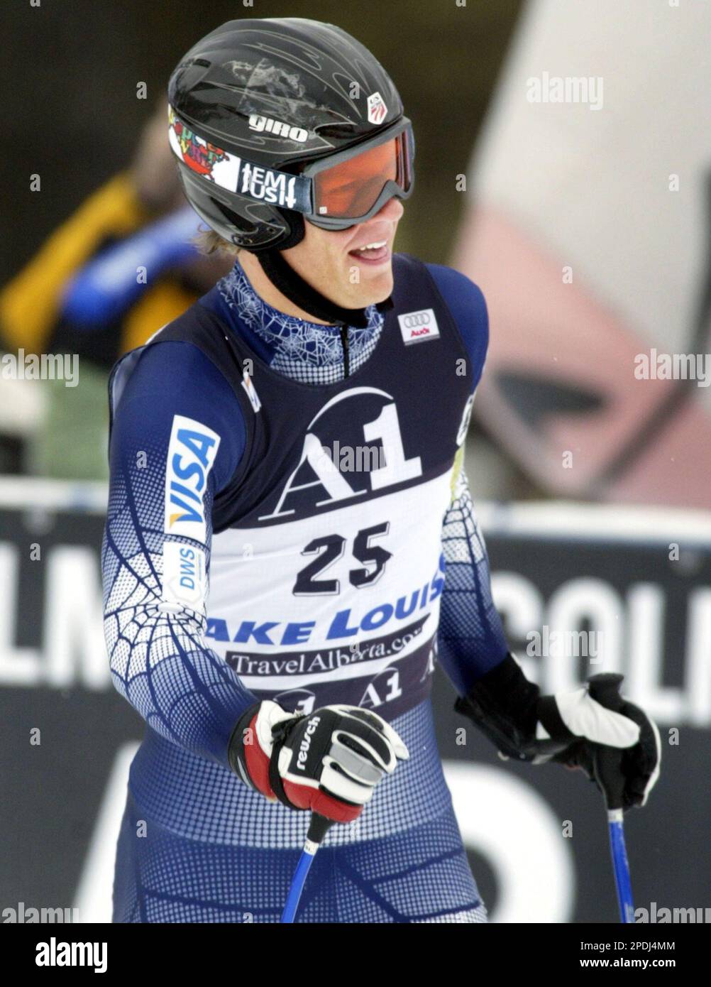 Steven Nyman, of the United States, catches his breath after finishing ...