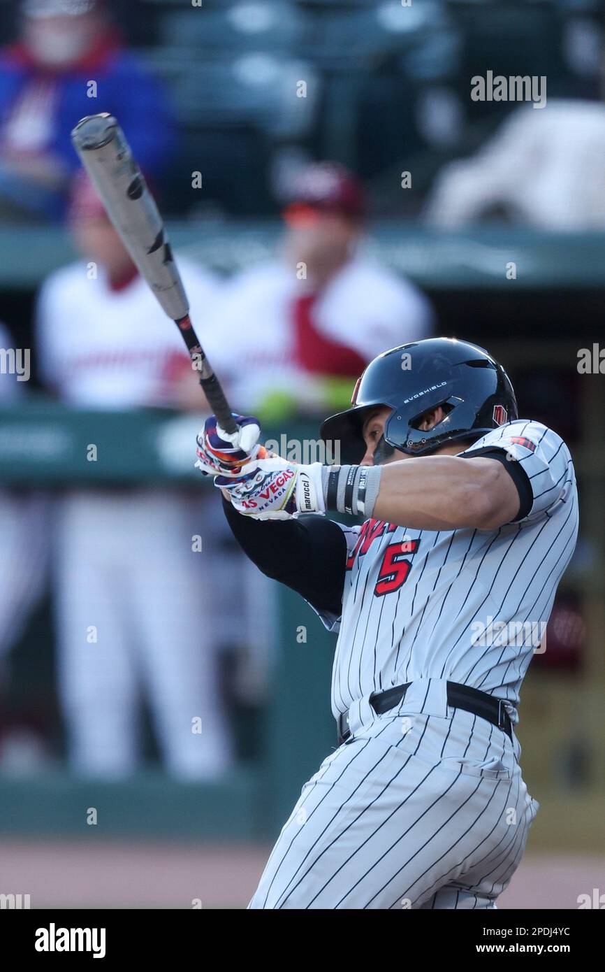 Bat. 14th Mar, 2023. Jacob Sharp #5 of UNLV follows through on his ...