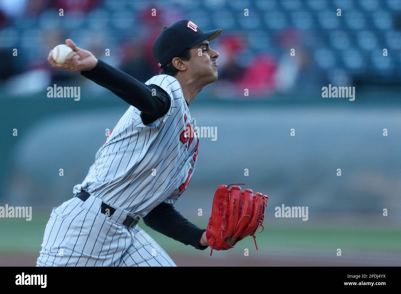 March 14, 2023: Joey Acosta #19 HustlinÕ Rebels pitcher works from the ...