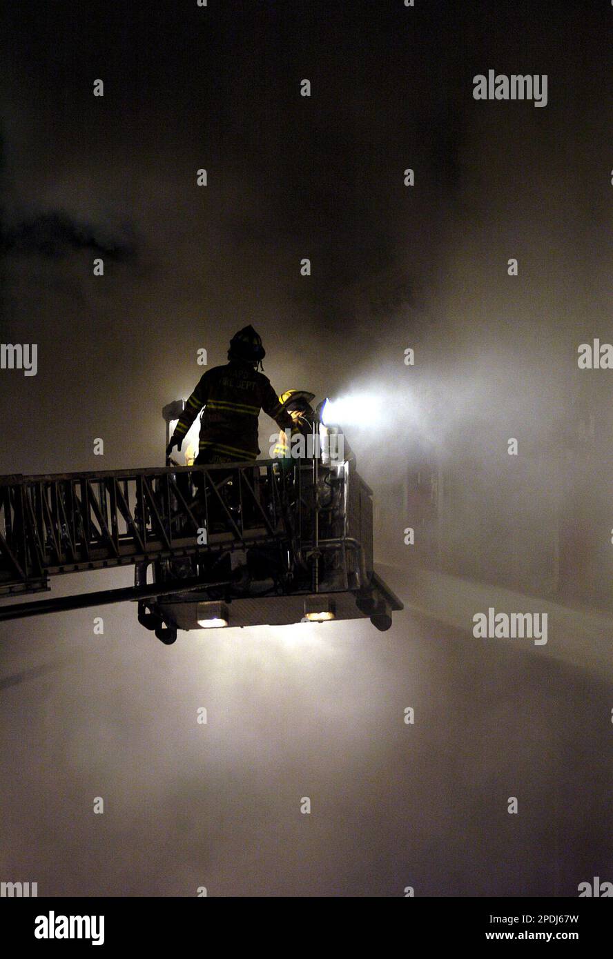 Firefighters battle a six-alarm fire that started on the 100 block of ...