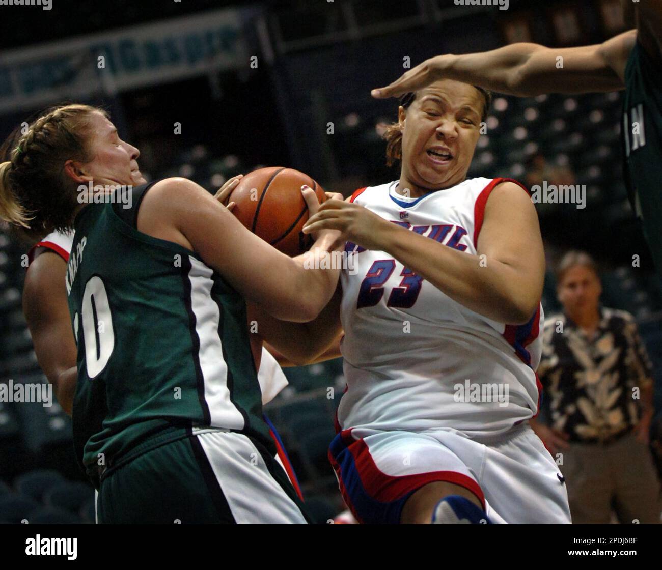 Eastern Michigan's Nikki Knapp, left, battles for posession of the ball ...