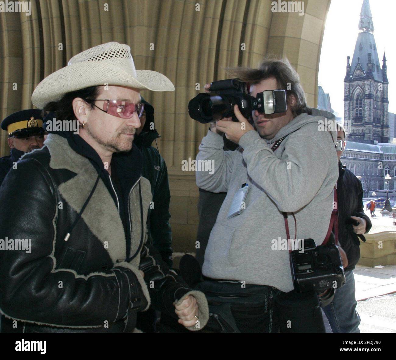 Irish rockstar Bono arrives for a news conference on Parliament Hill in ...