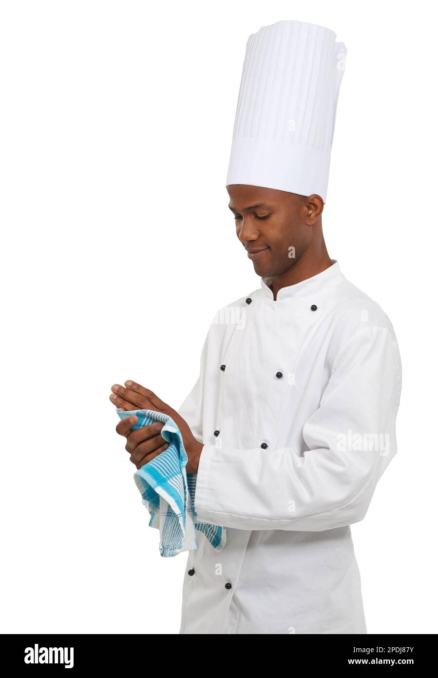 Hes all about hygiene in the kitchen. An african chef cleaning his ...