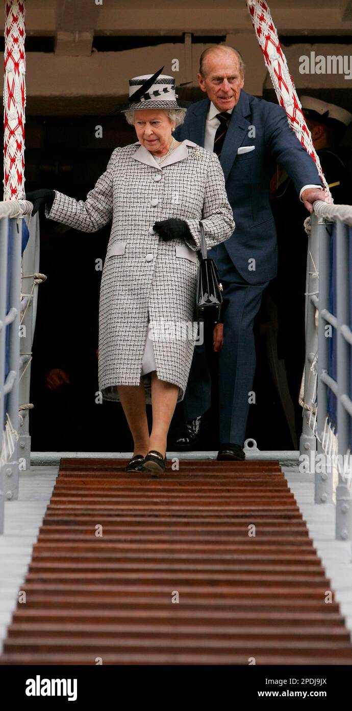 Britain's Queen Elizabeth II, left, and her husband Prince Philip ...