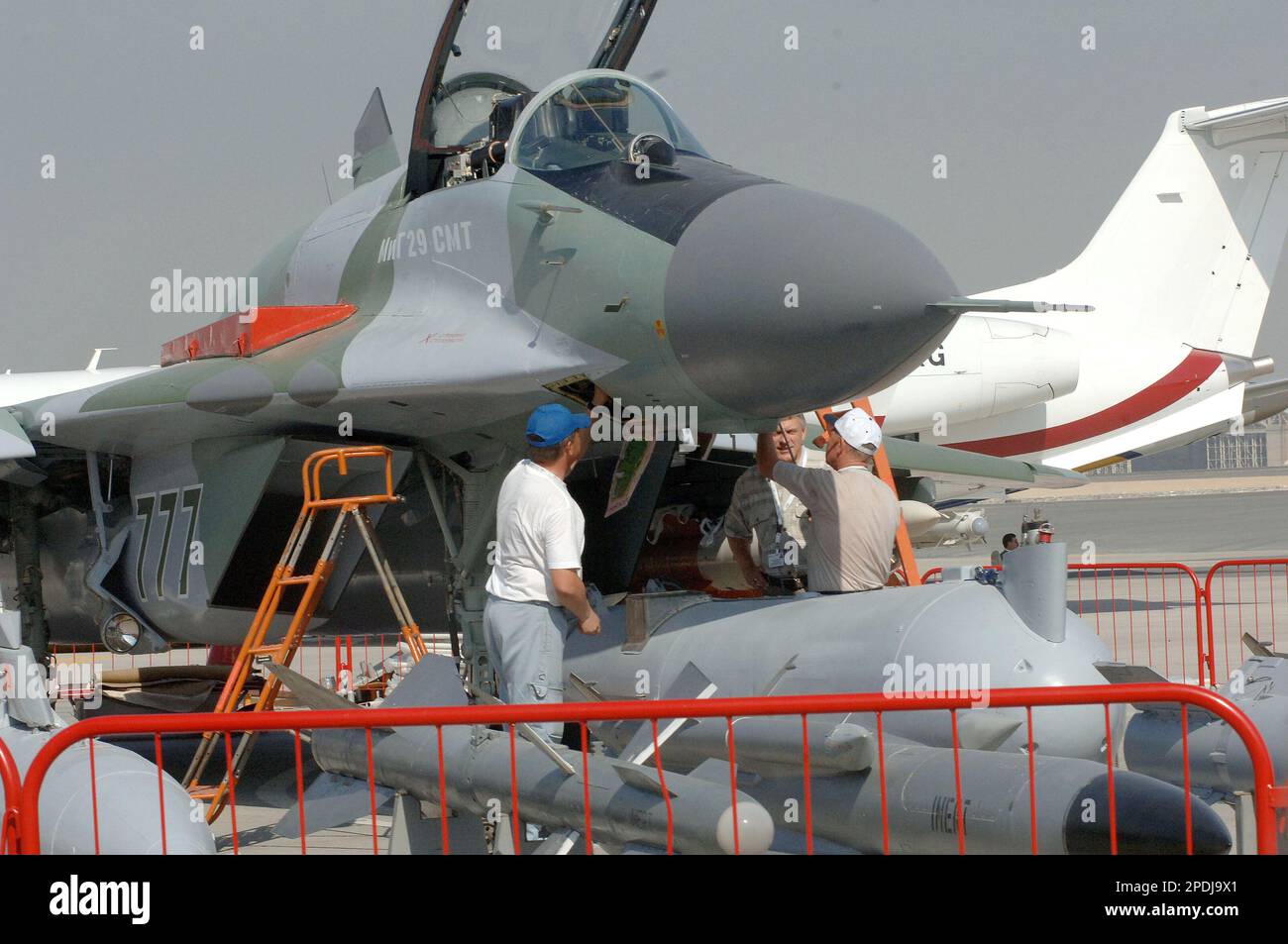 Technicians of Russian made Mig 29 SMT carry out checks , during the ...