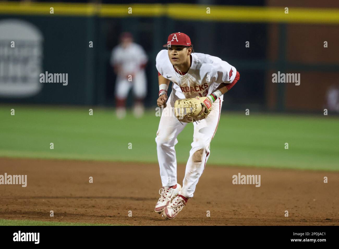 March 14, 2023: Jayson Jones #13 Arkansas infielder bounces off of ...