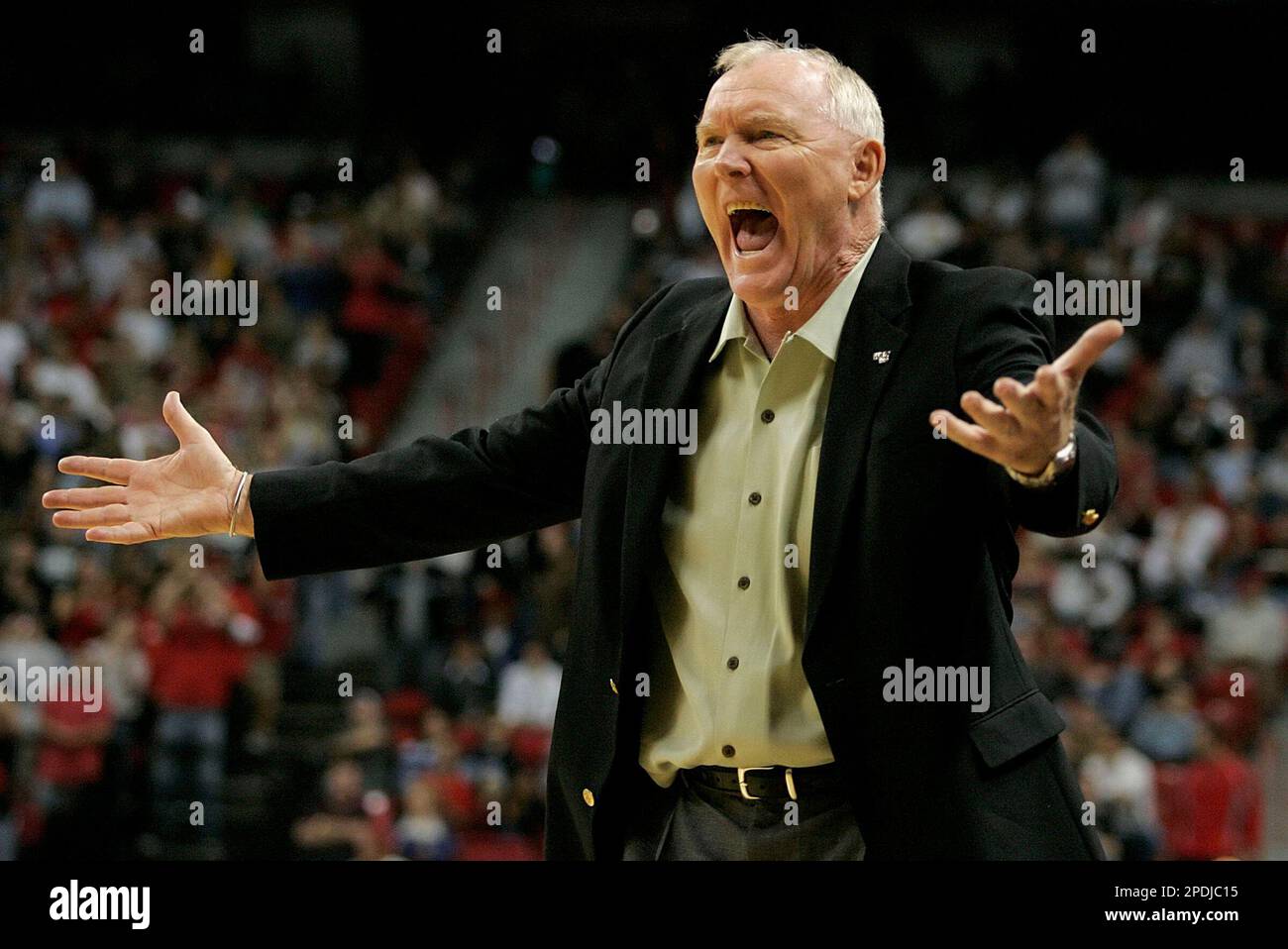 Hawaii coach Riley Wallace reacts to a foul called on his team in the ...