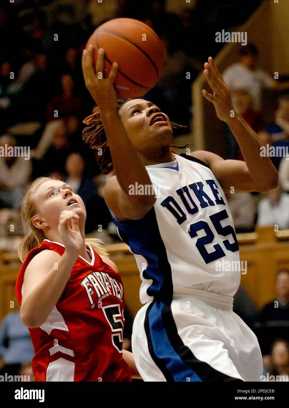 Duke's Monique Curry (25) shoots over Fairfield's Clare Fauote (52) in ...