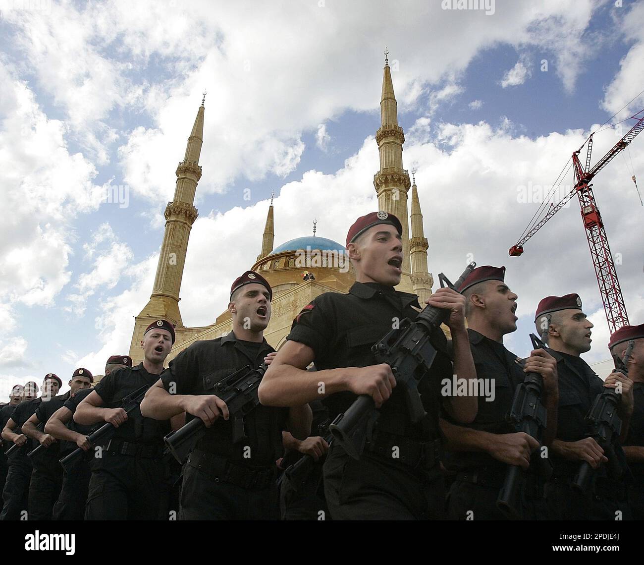 Lebanese soldiers from the special forces unit march in frontof the ...