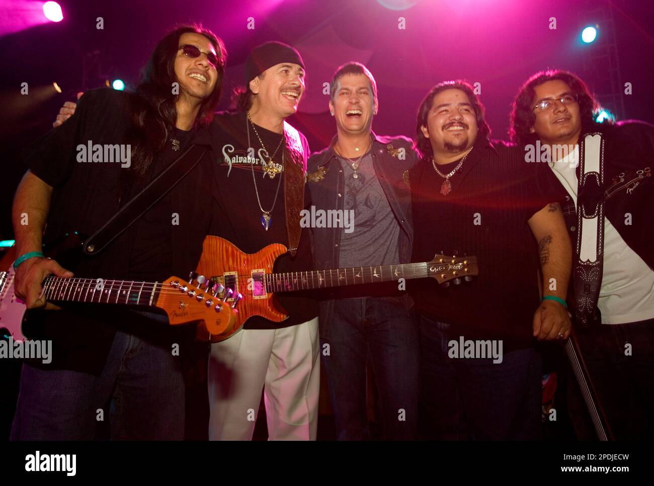 Musicians Henry Garza, Carlos Santana, Rob Thomas, Ringo Garza, and ...