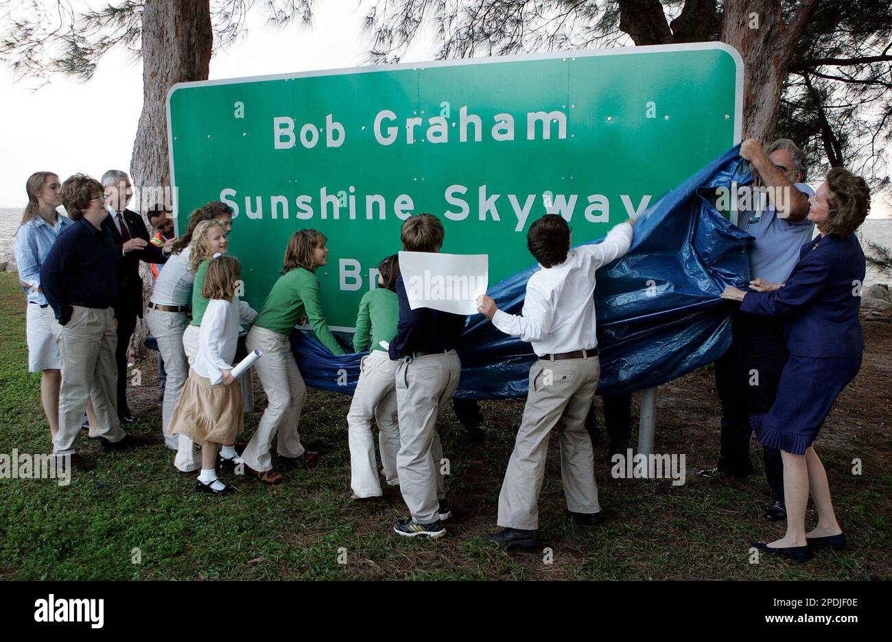 Former U.S. Sen. Bob Graham, third from left, and his wife Adele, right ...