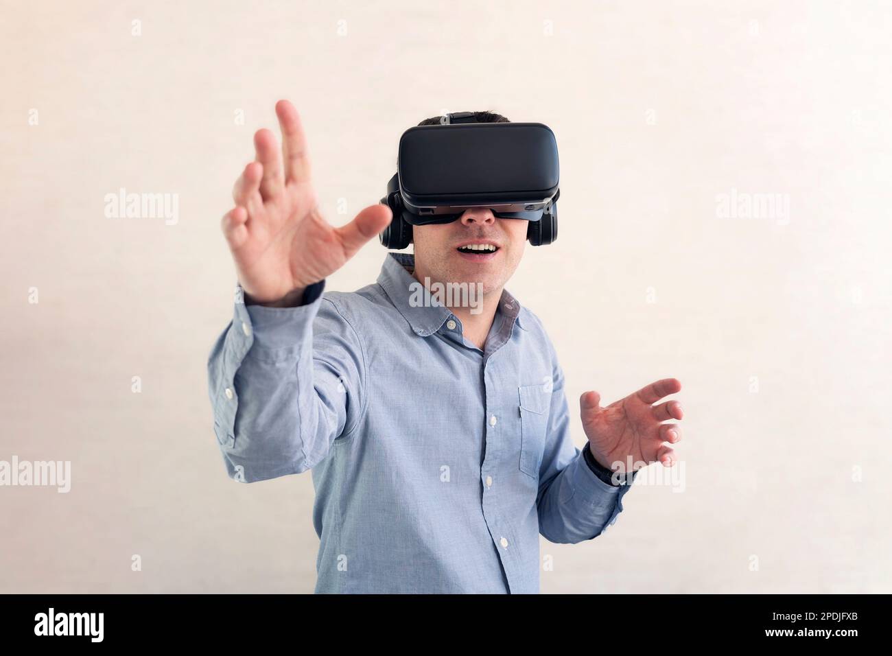 vr for phone and mobile gaming. man wearing virtual reality headset or ...