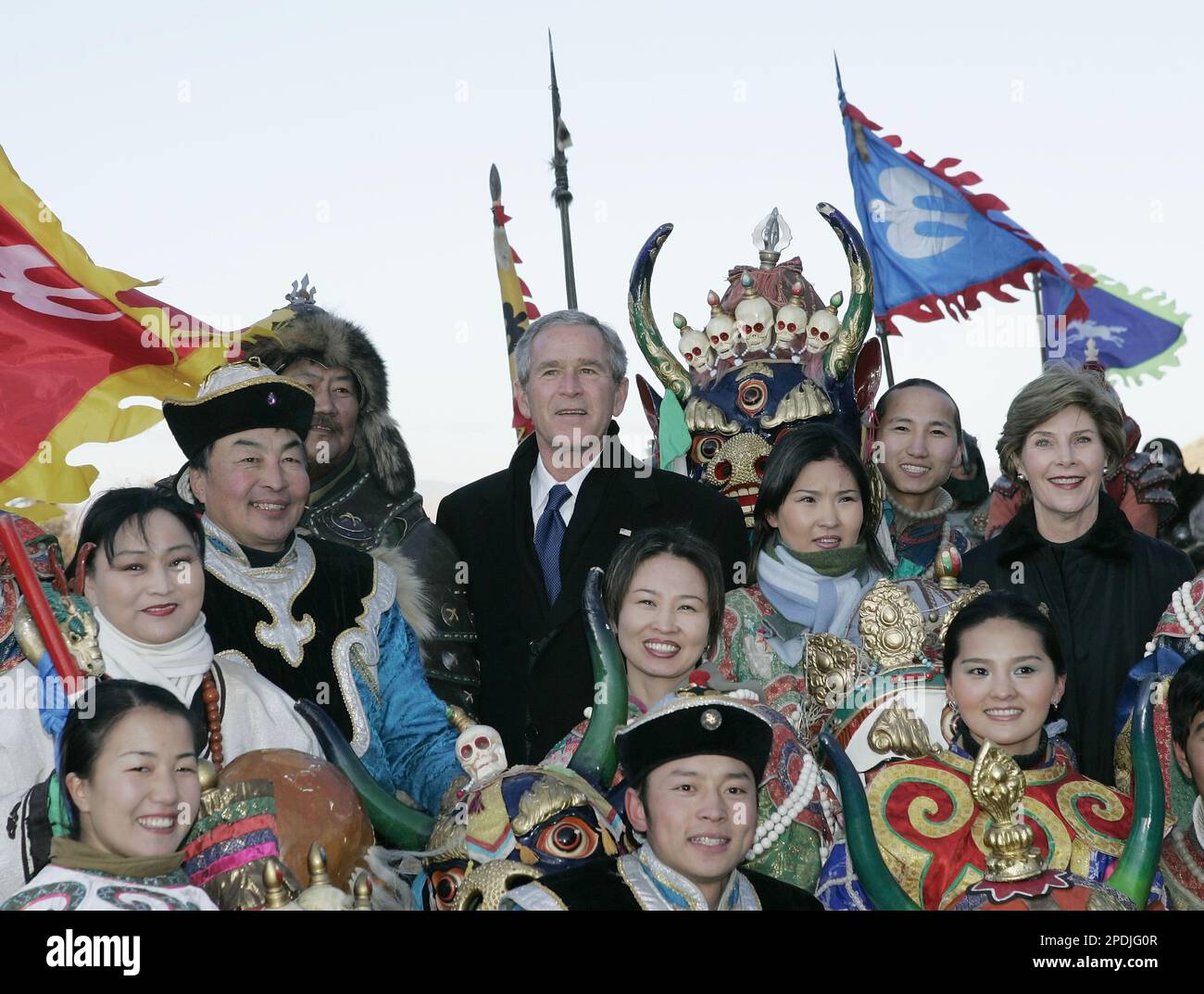 U.S. President George W. Bush and first lady Laura Bush pose for photo ...