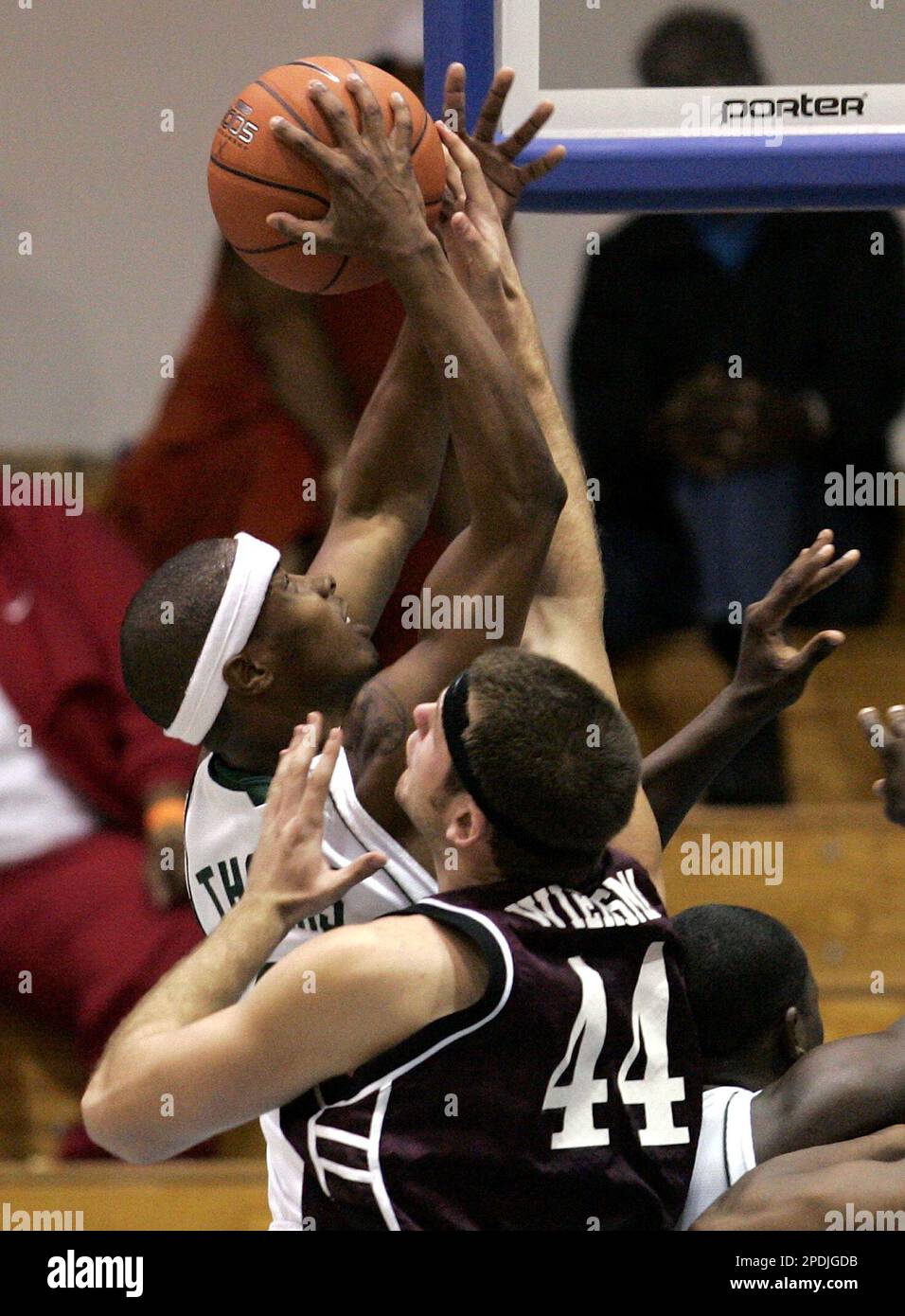 Norfolk State's Al'Davon Thomas is blocked by Eastern Kentucky's Ryan ...