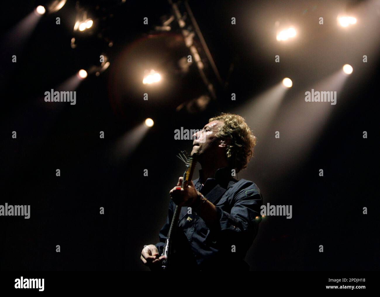 Coldplay's Chris Martin performs during a concert in Barcelona, Spain ...