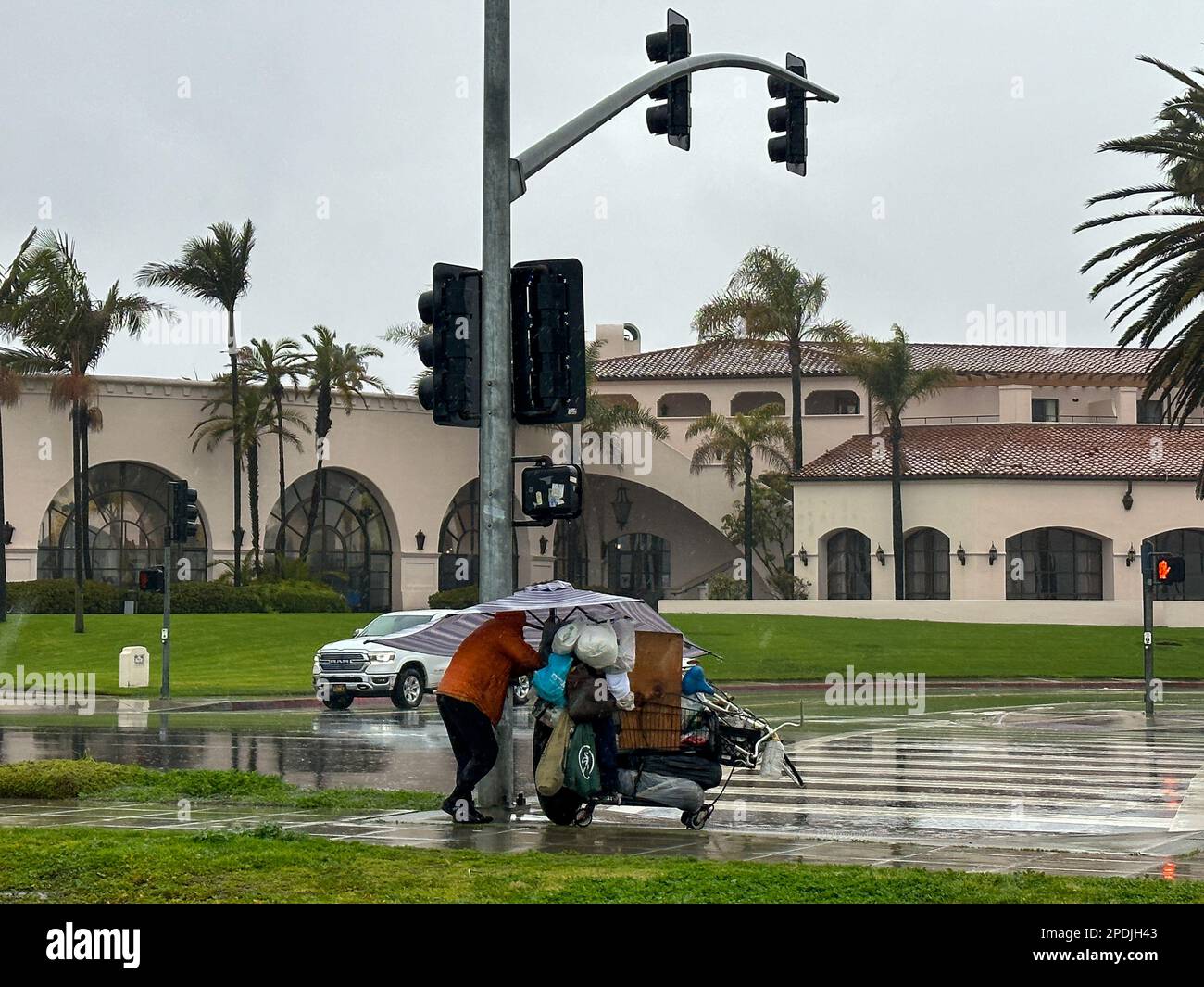 Santa Barbara, California, USA. 14th Mar, 2023. A homeless man walks ...
