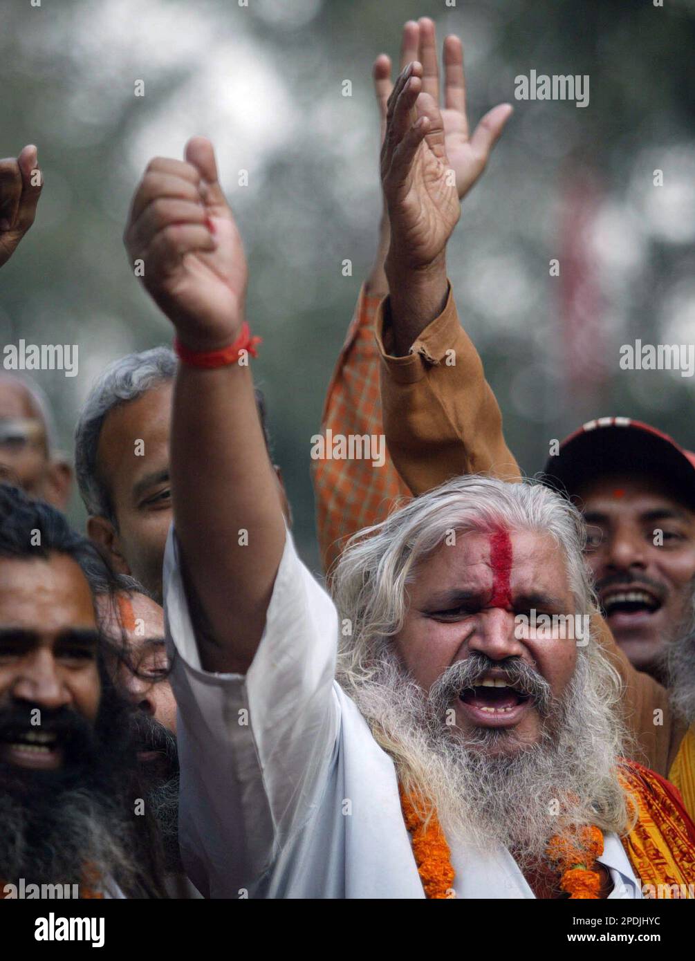 Sadhus or Hindu holy men protest against the blockade of flow of waters ...