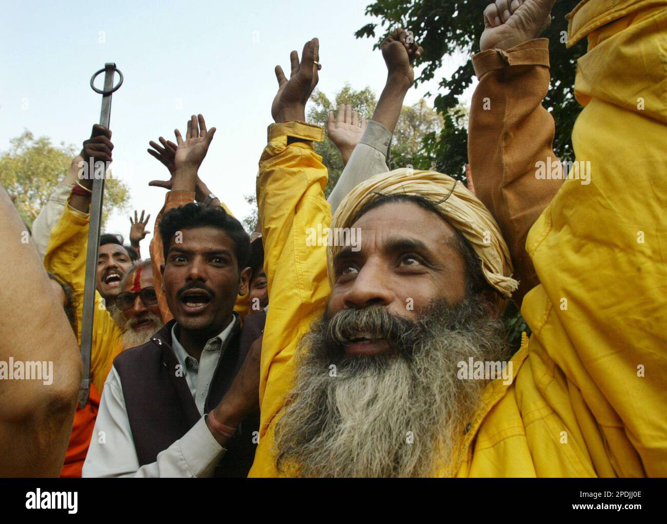 Sadhus or Hindu holy men protest against the blockade of flow of waters ...