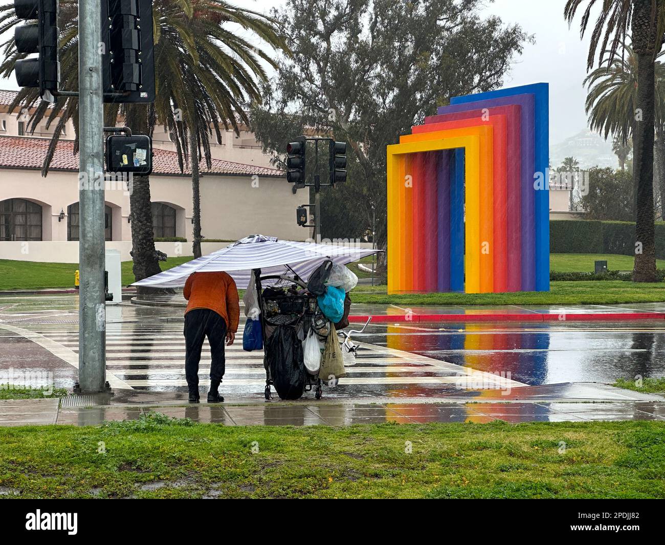 Santa Barbara, California, USA. 14th Mar, 2023. A homeless man walks ...