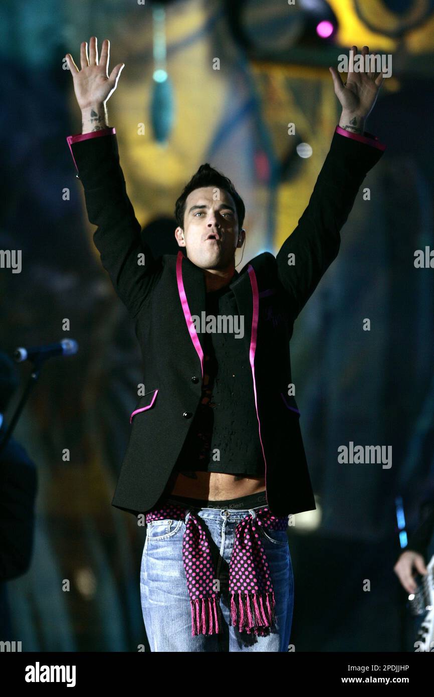 Pop singer Robbie Williams performs during promotion of his new album ...