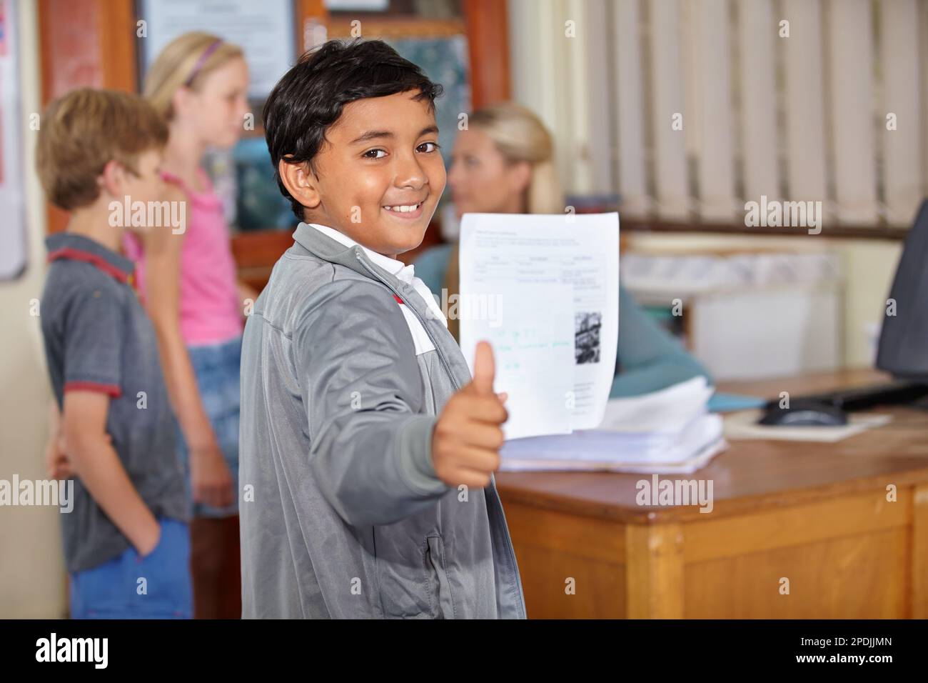 I know Ill get a good grade. Portrait of a smiling ethnic school boy ...