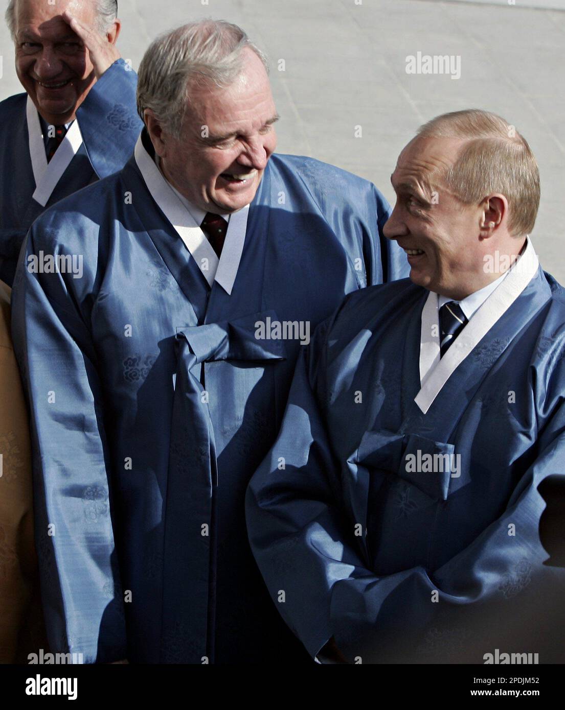 Canadian Prime Minister Paul Martin, left, shares a laugh with Russian ...
