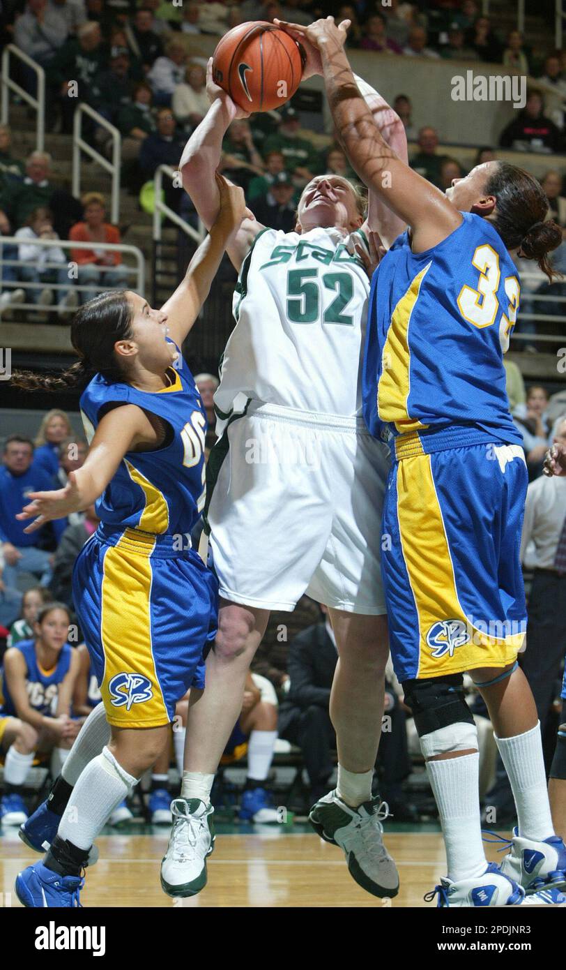 Michigan State's Liz Shimek (52) shoots between UC Santa Barbara's ...