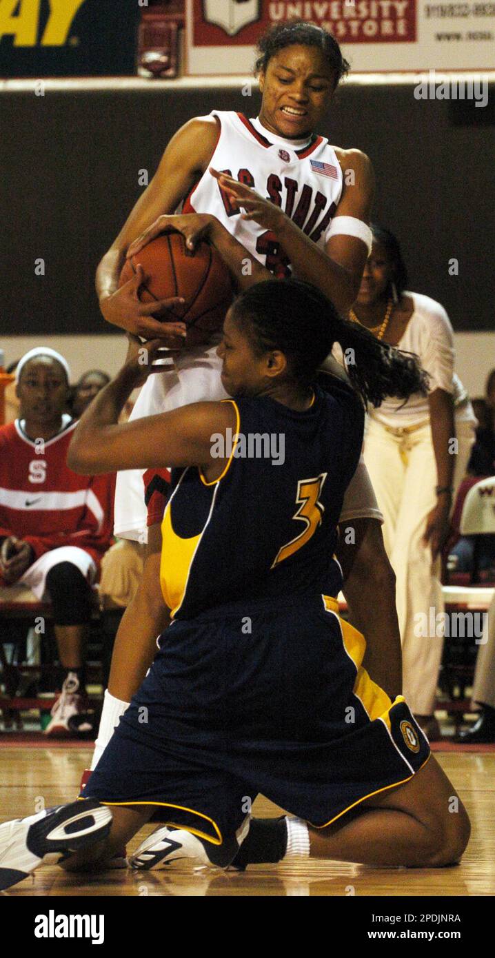 North Carolina State's Keisha Brown, top, wrests the ball from North ...