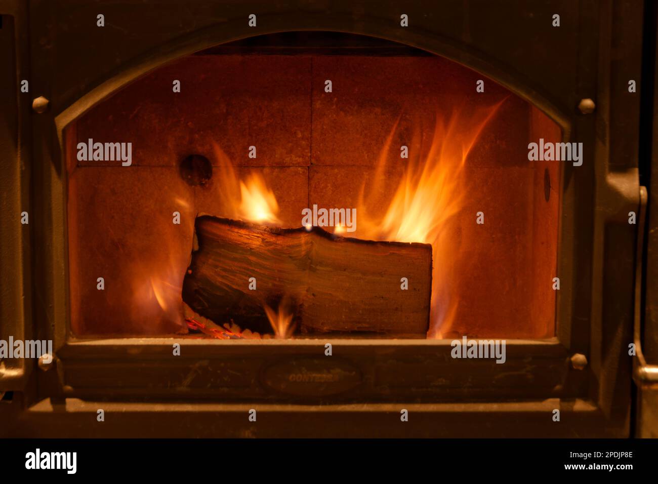 A wonderful log fire in a wood burning stove. A wonderful, warming wood ...