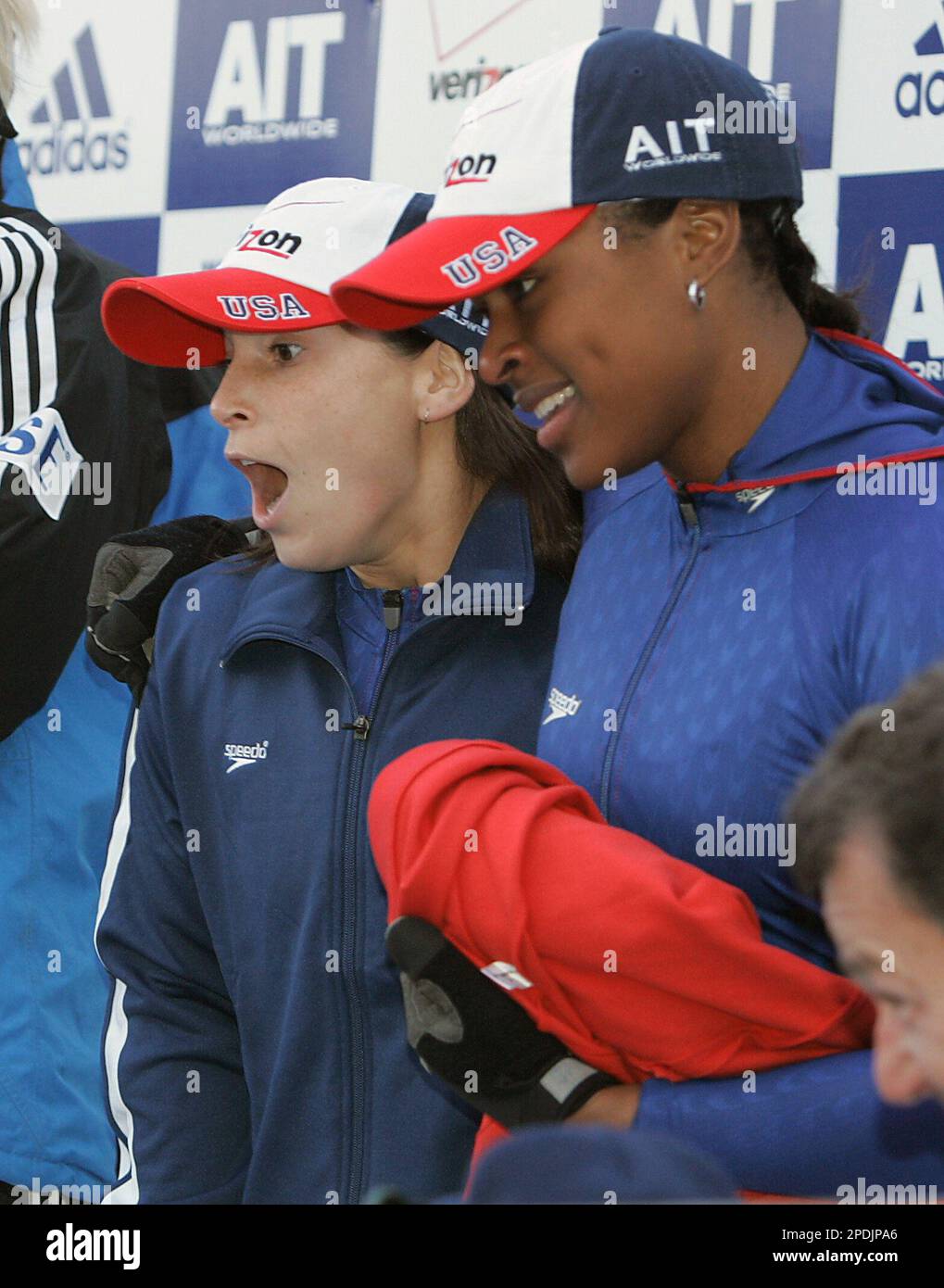 USA 3 bobsled team Jean Prahm, left, and Vonetta Flowers watch a TV ...