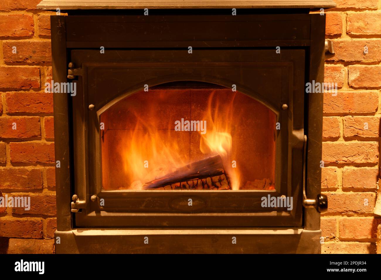 A wonderful log fire in a wood burning stove. A wonderful, warming wood ...