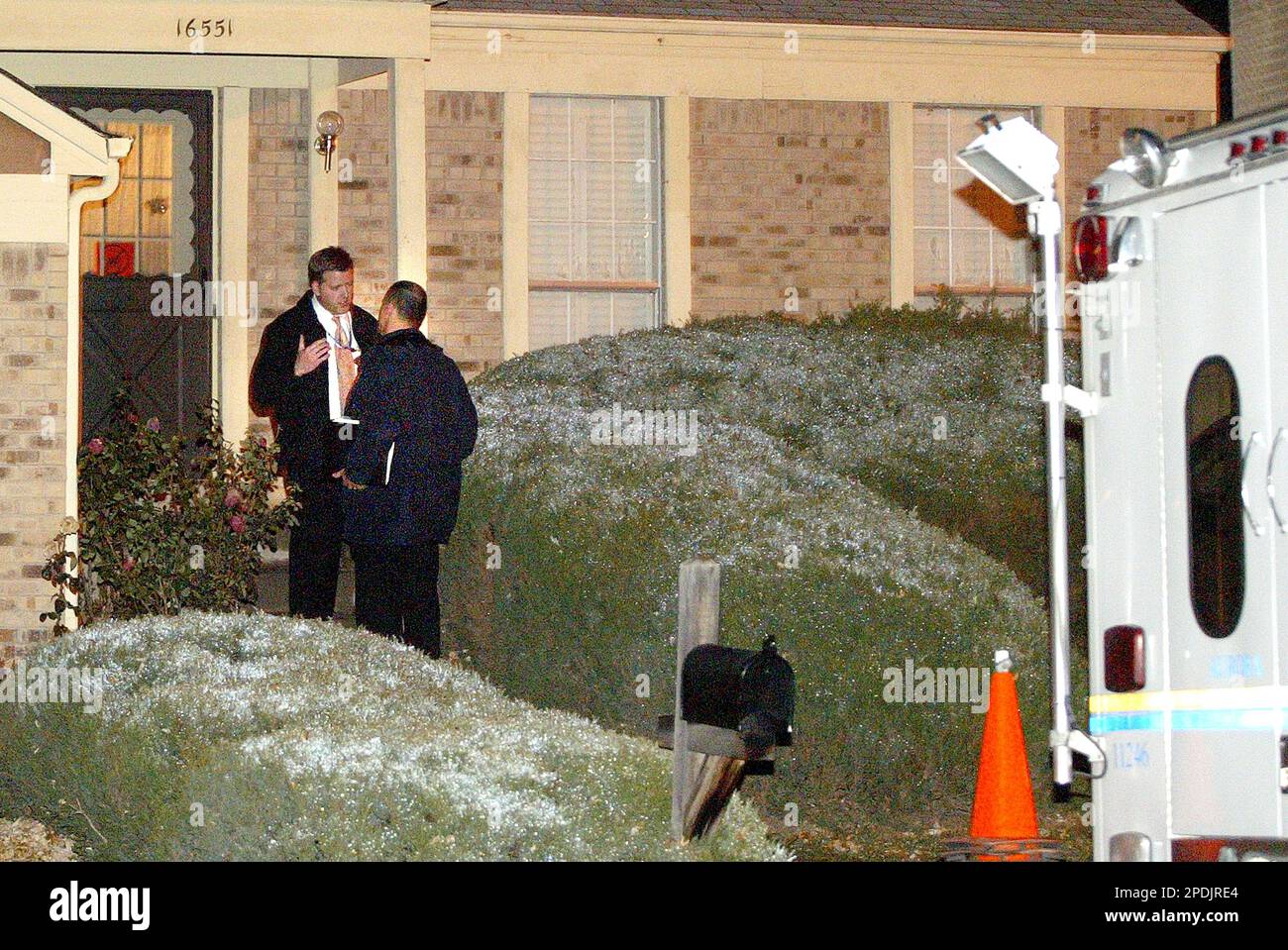 Aurora police officers talk at the home where 6-year-old Aarone ...