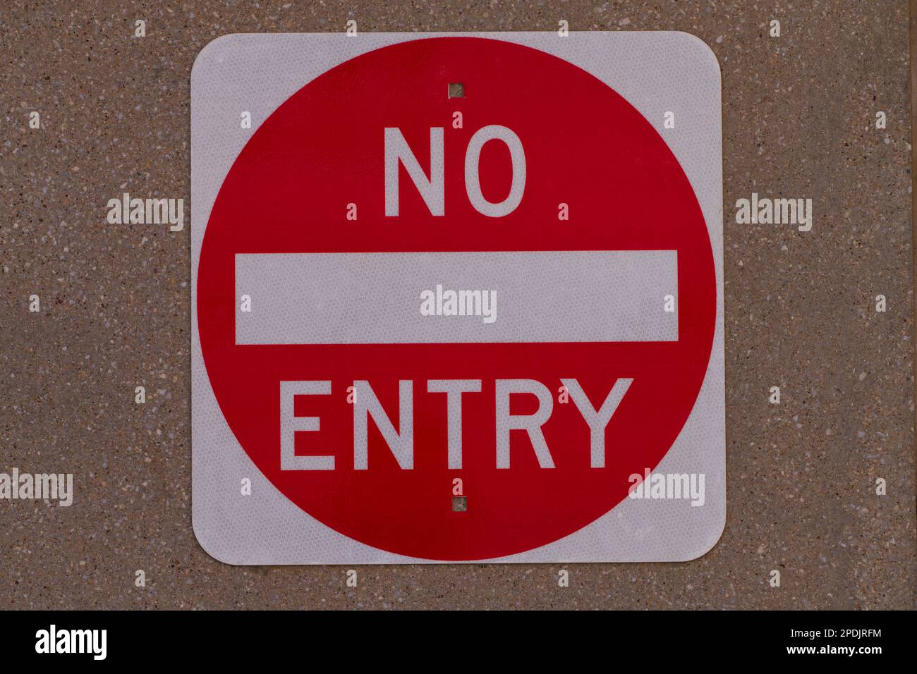 Metal no entry sign isolated on a concrete wall background, with red ...