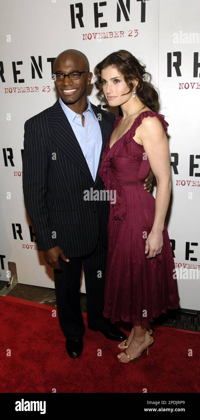 Actor Taye Diggs, left, and his wife, actress Idina Menzel arrive at ...